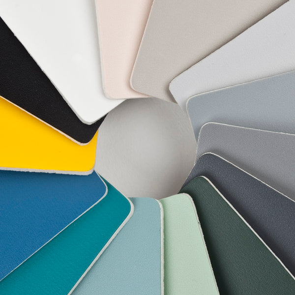 A pack of vinyl flooring samples containing 14 vinyl flooring colours ...